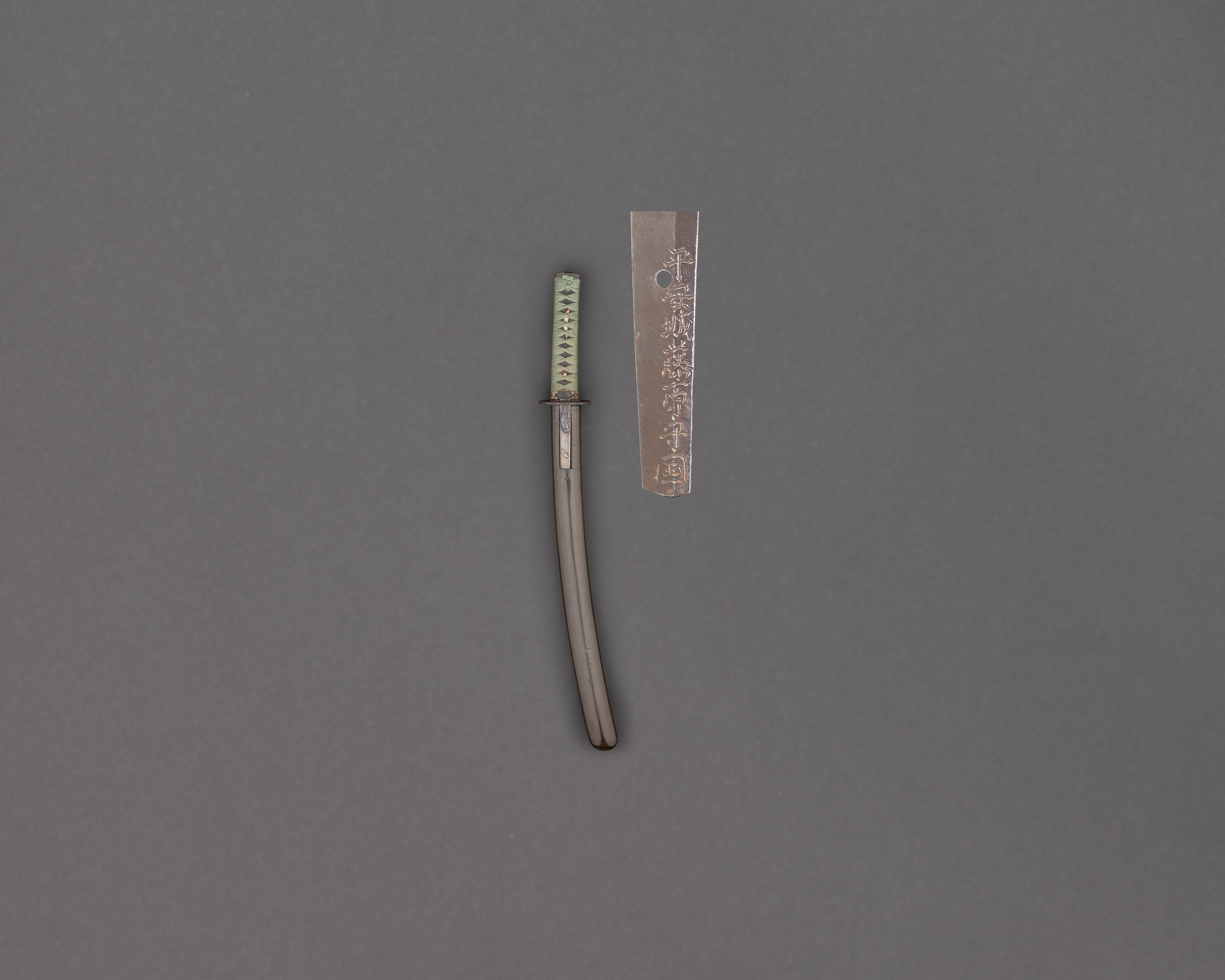 Bonhams : A wakizashi in buke-zukuri koshirae Signed on omote, Heianjo ...