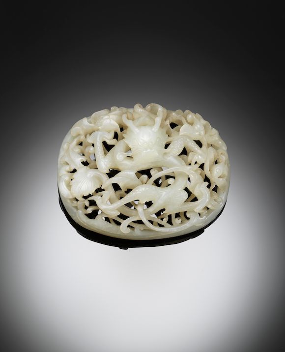 Bonhams : A jade 'dragon' oval plaque Late Ming/early Qing dynasty