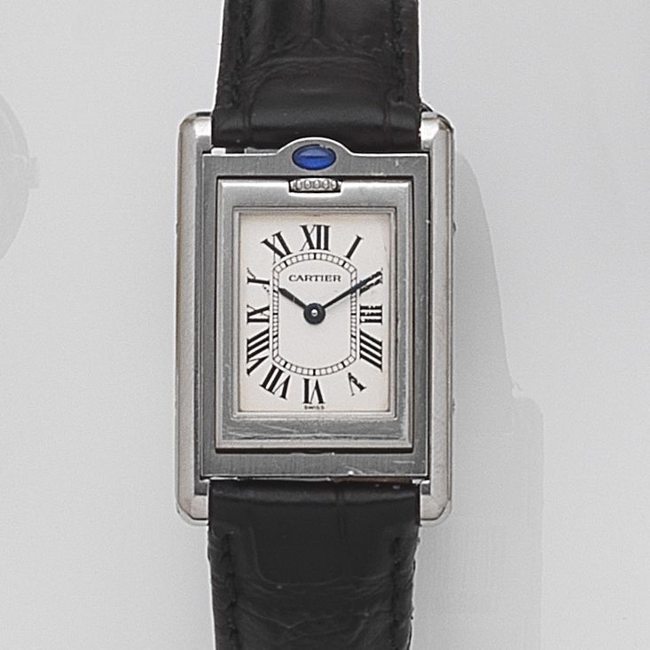 Bonhams : Cartier. A stainless steel quartz reversible wristwatch Tank ...