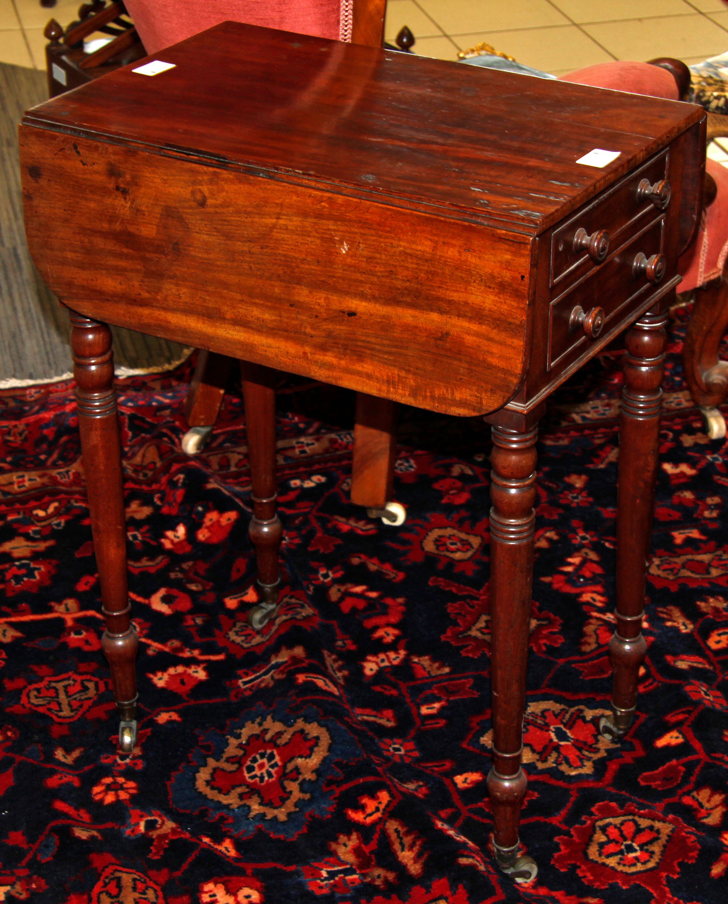 Bonhams : A late Regency rosewood drop flap work table