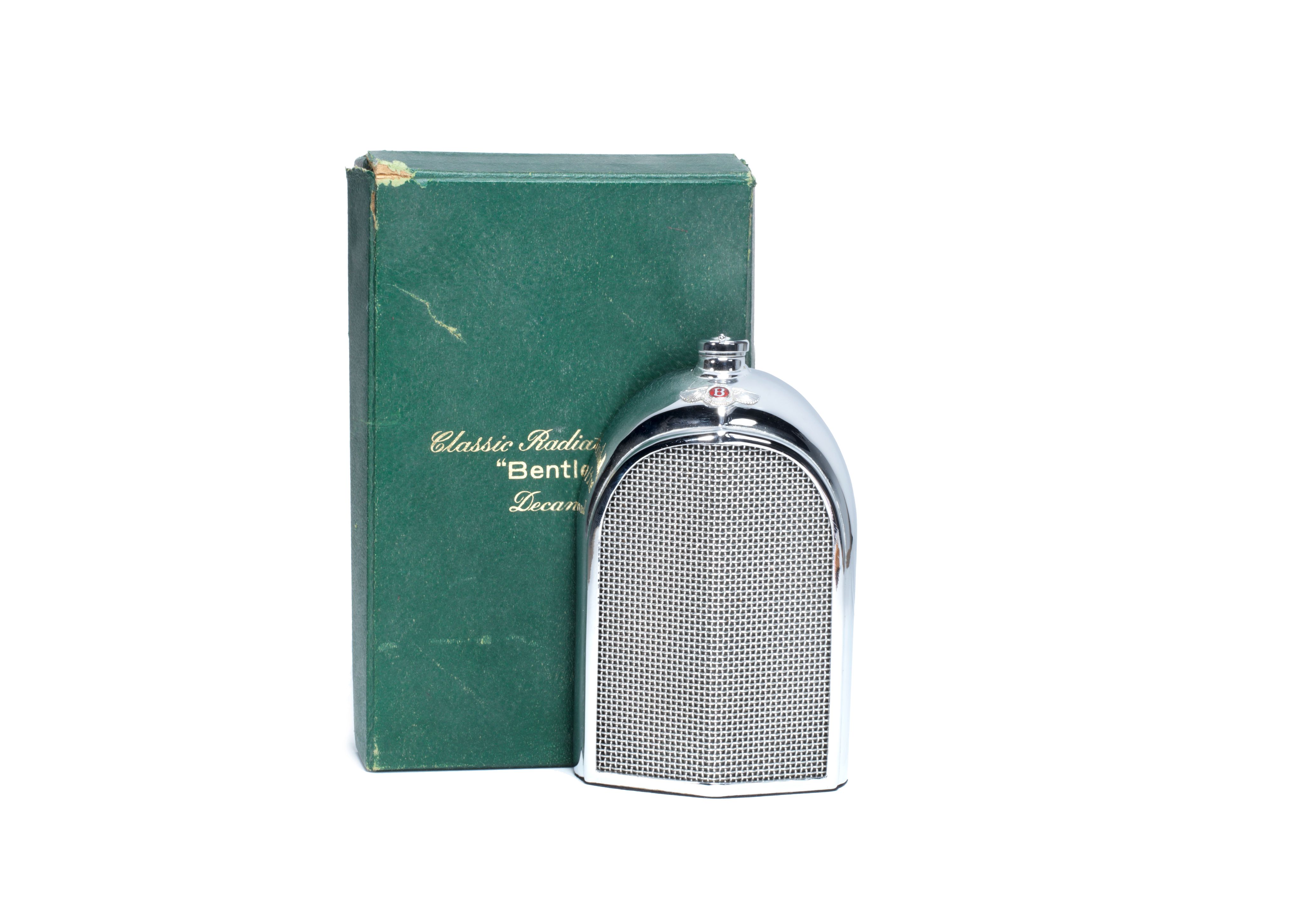 Bonhams Cars : A cased Bentley radiator decanter by Ruddspeed,