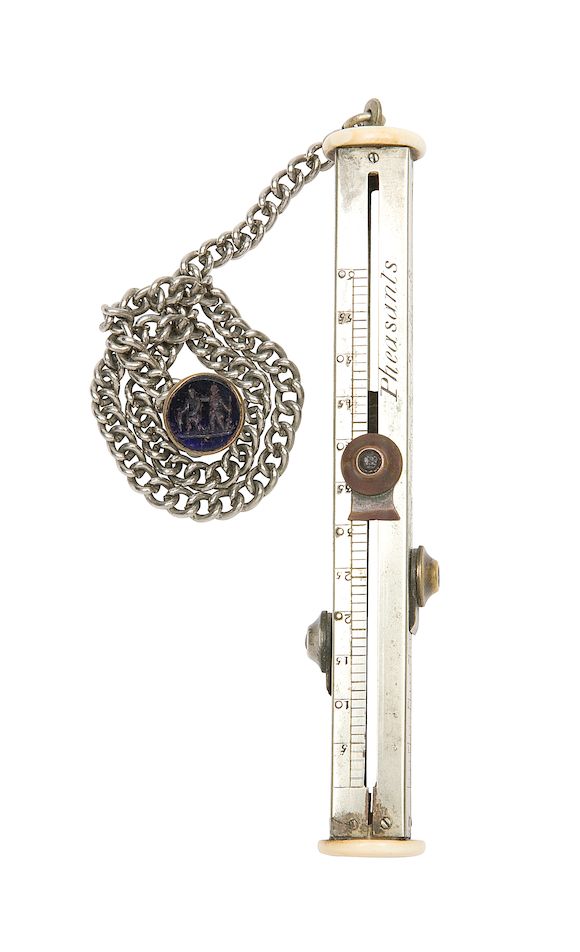 Bonhams : A Rare White-Metal Tubular Bar Game Counter