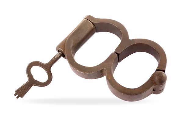 Bonhams : A pair of antique 'R.C.S.' figure eight steel convict handcuffs