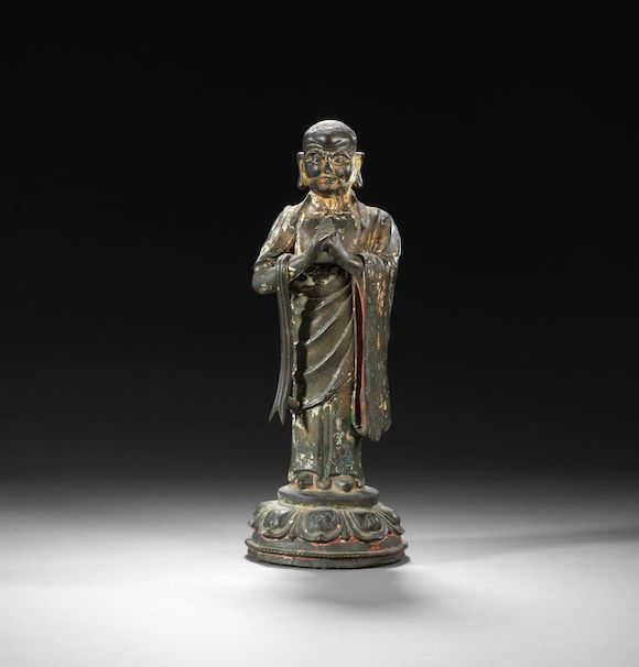 Bonhams : A gold-painted lacquered-bronze luohan Ming dynasty