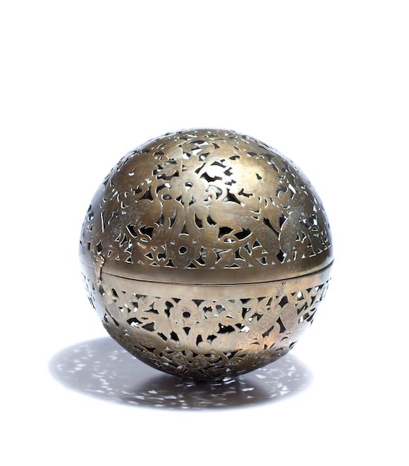 Bonhams : A large pierced brass incense ballProbably Dutch East Indies ...