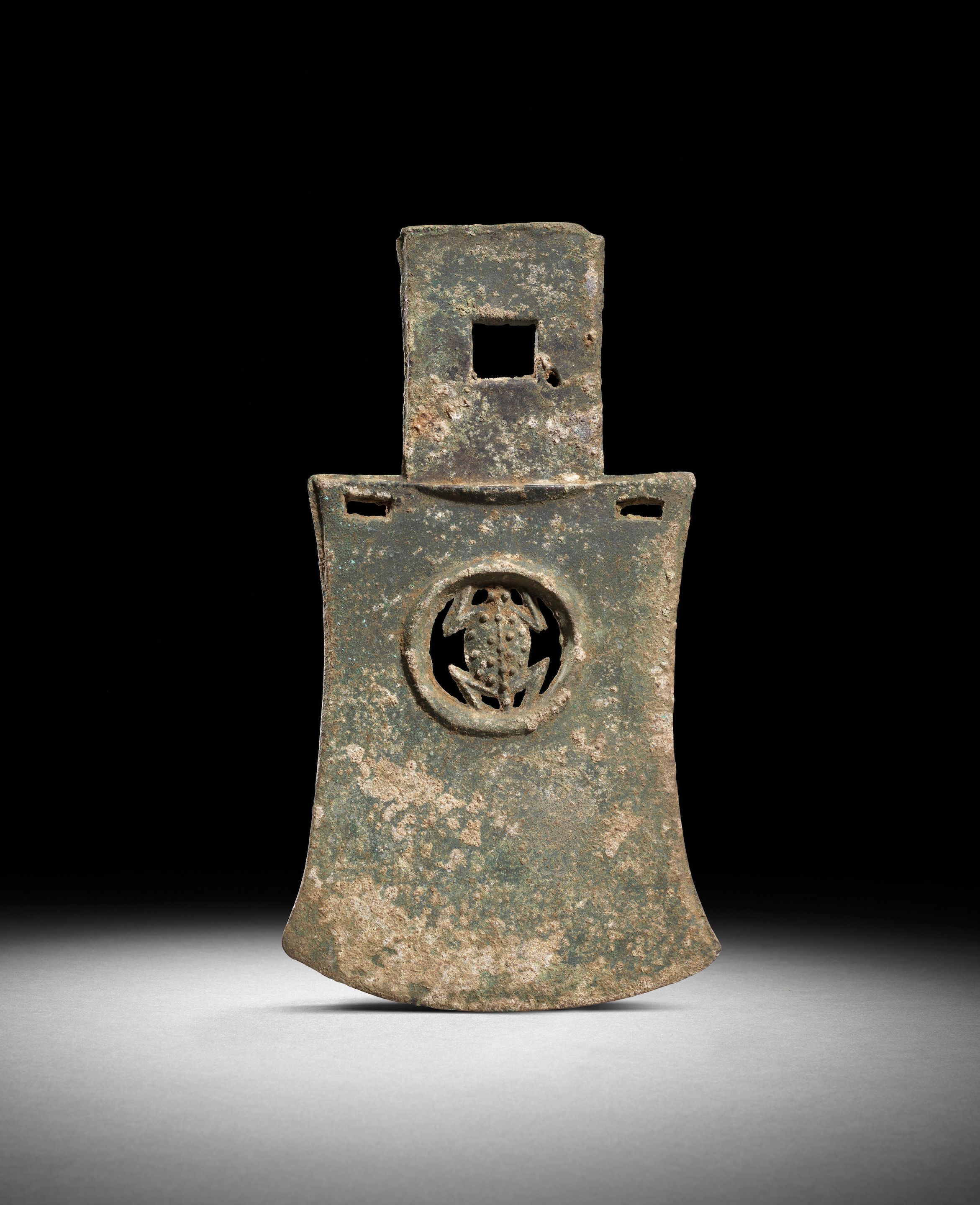 Bonhams : An archaic bronze 'toad' axe-head, yue Late Shang dynasty