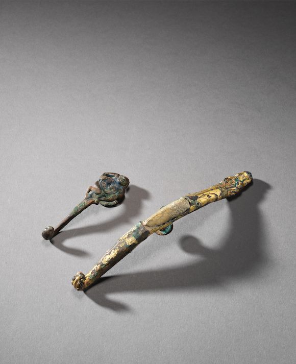 Bonhams : Two archaic bronze gold-inlaid belt buckles Western Han ...