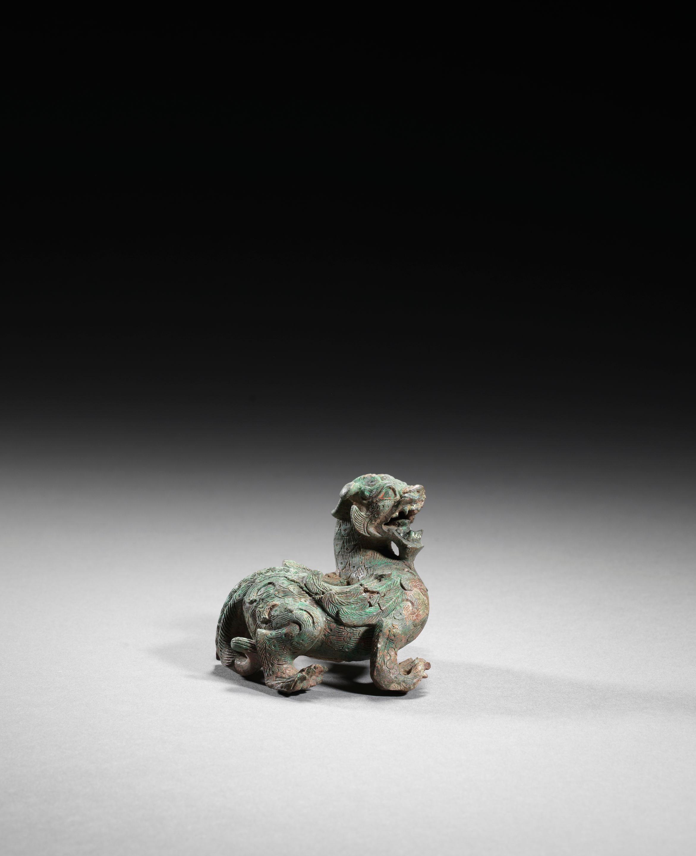 Bonhams : An archaic bronze 'mythical beast' paperweight Eastern Han ...