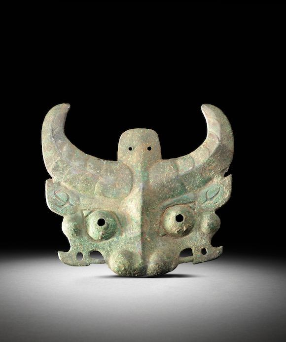 Bonhams : An archaic bronze 'zoomorphic' mask Late Shang dynasty