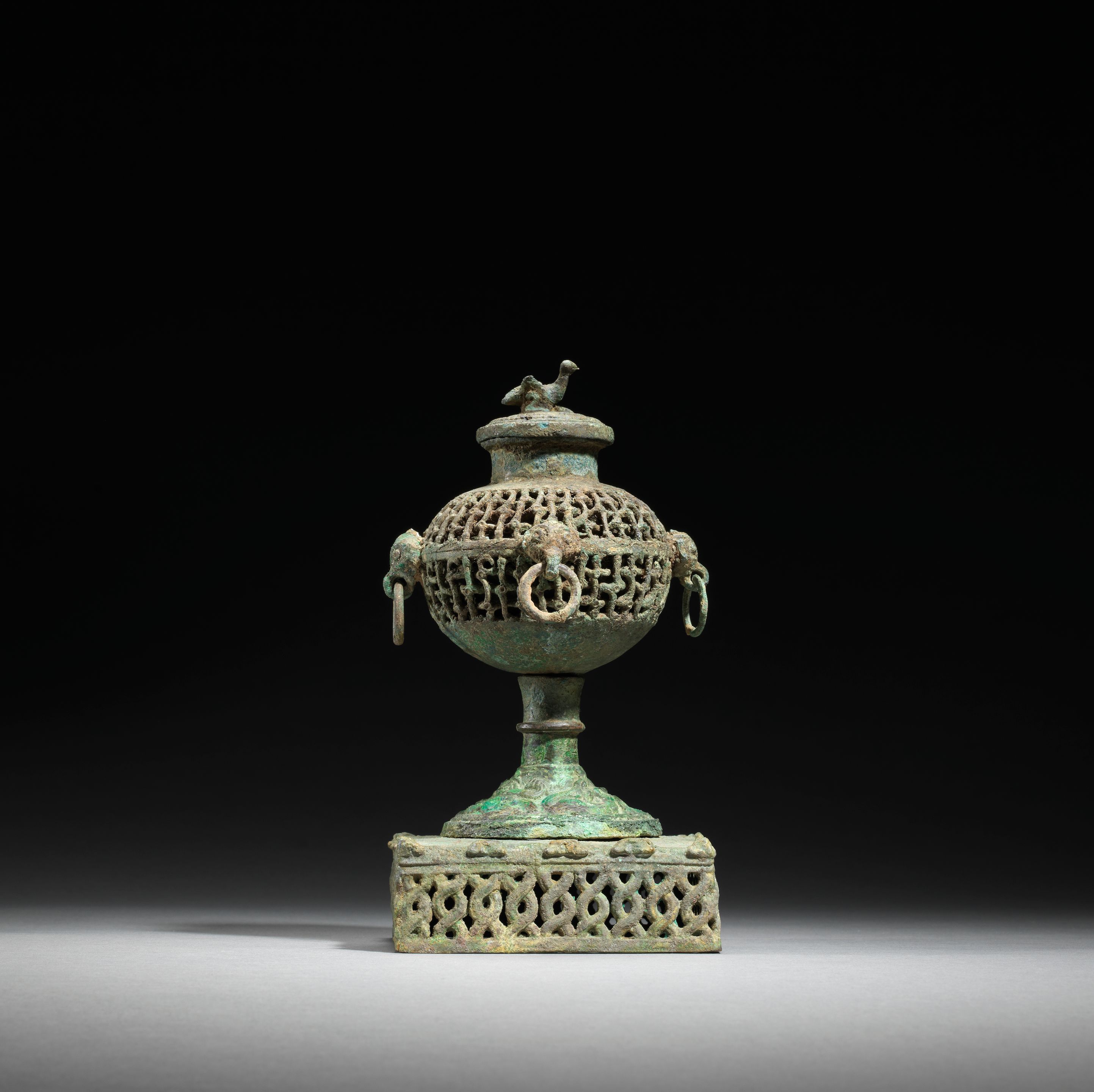 Bonhams : A reticulated archaic bronze altar vessel and cover, gui ...