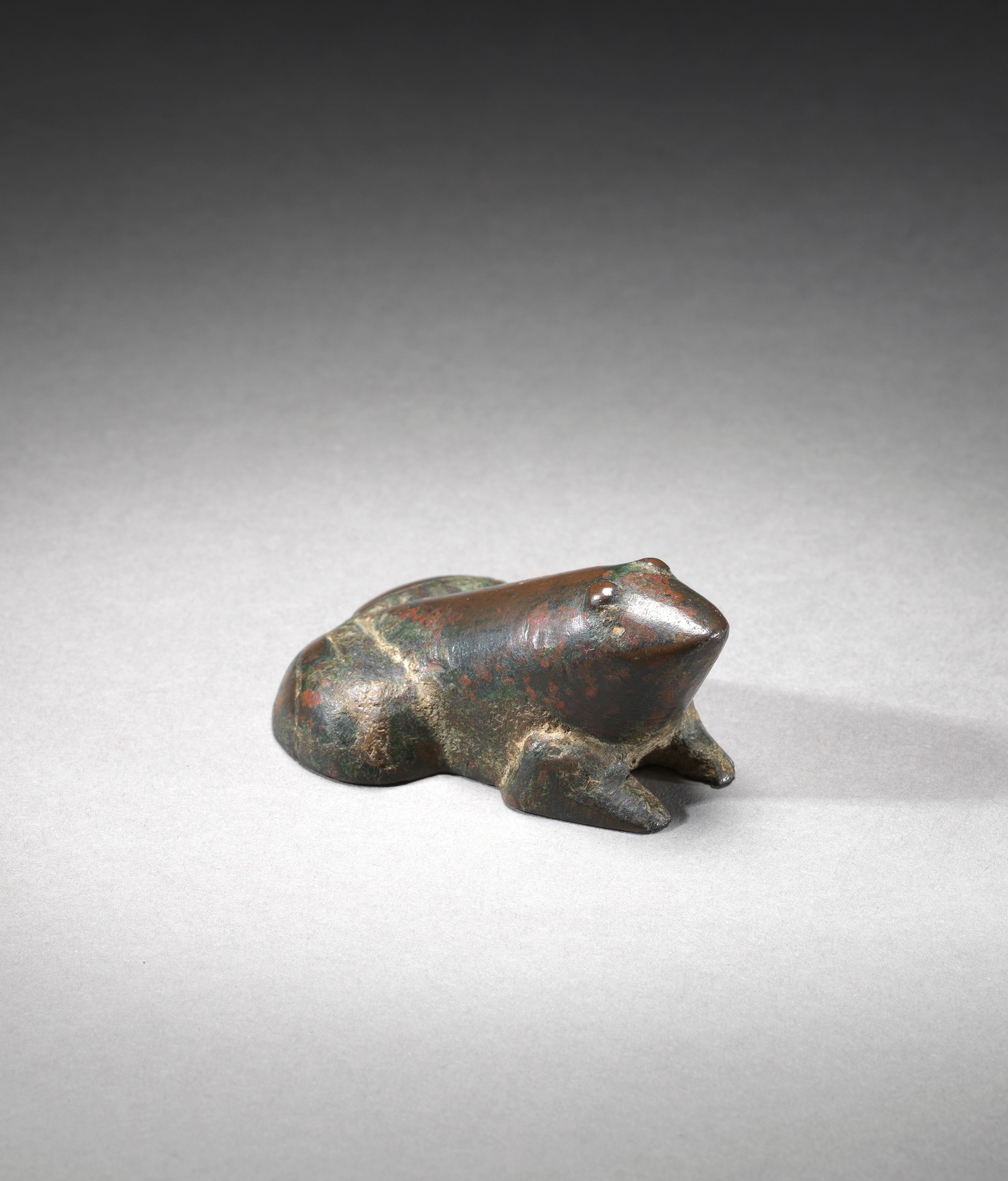 Bonhams : An archaic bronze 'frog' paperweight Han dynasty