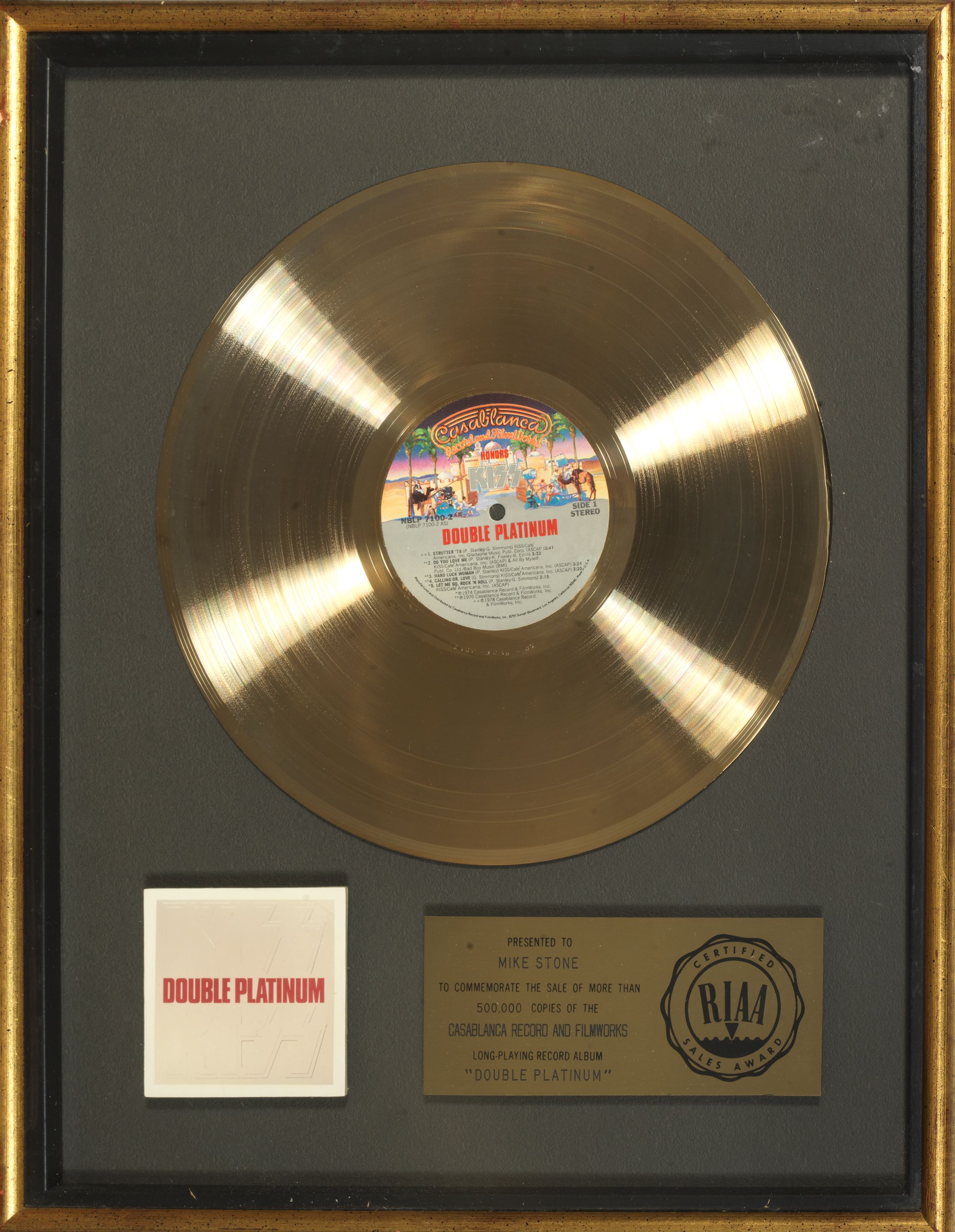 Bonhams : Kiss A group of RIAA sales awards, presented to Mike Stone,
