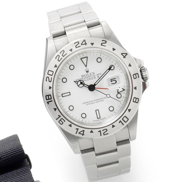 Bonhams : Rolex. A stainless steel automatic calendar dual time zone ...