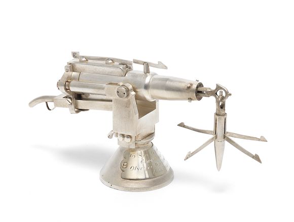 Bonhams : An electroplated novelty table lighter modelled as a harpoon gun