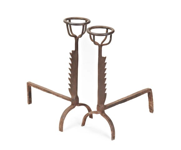 Bonhams : A pair of cresset-top wrought iron spit dogs 17th/18th century