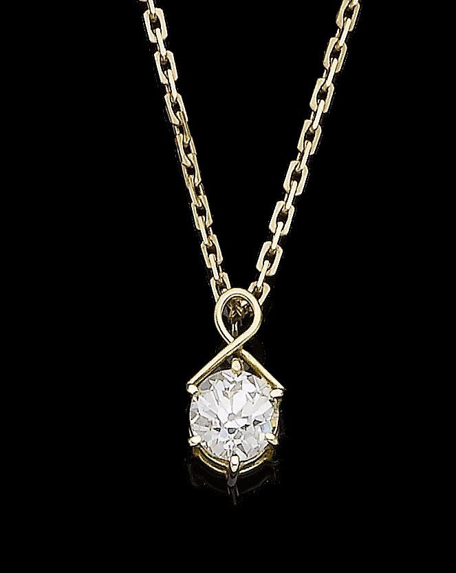 Bonhams : A diamond single-stone pendant necklace