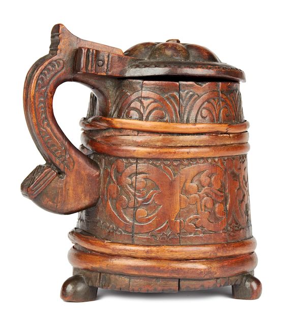 Bonhams : An 18th century carved birch and pine coopered tankard, Norwegian