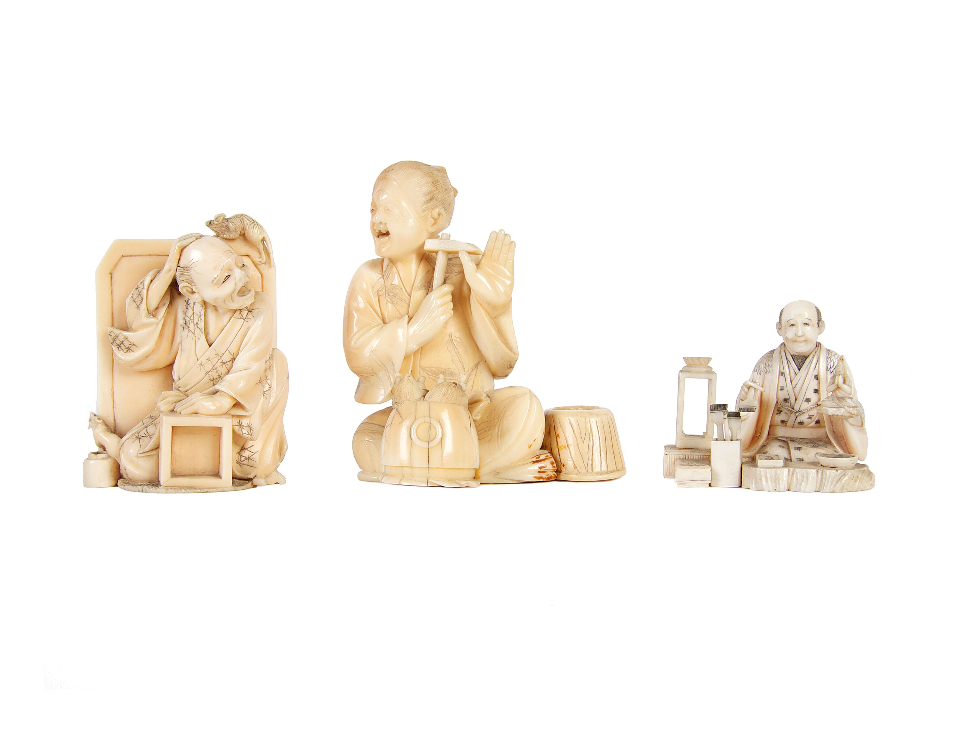 Bonhams : Three Japanese stained ivory okimono, Meiji period