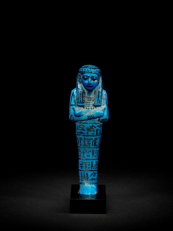 Bonhams : An Egyptian bright blue glazed composition shabti for the ...