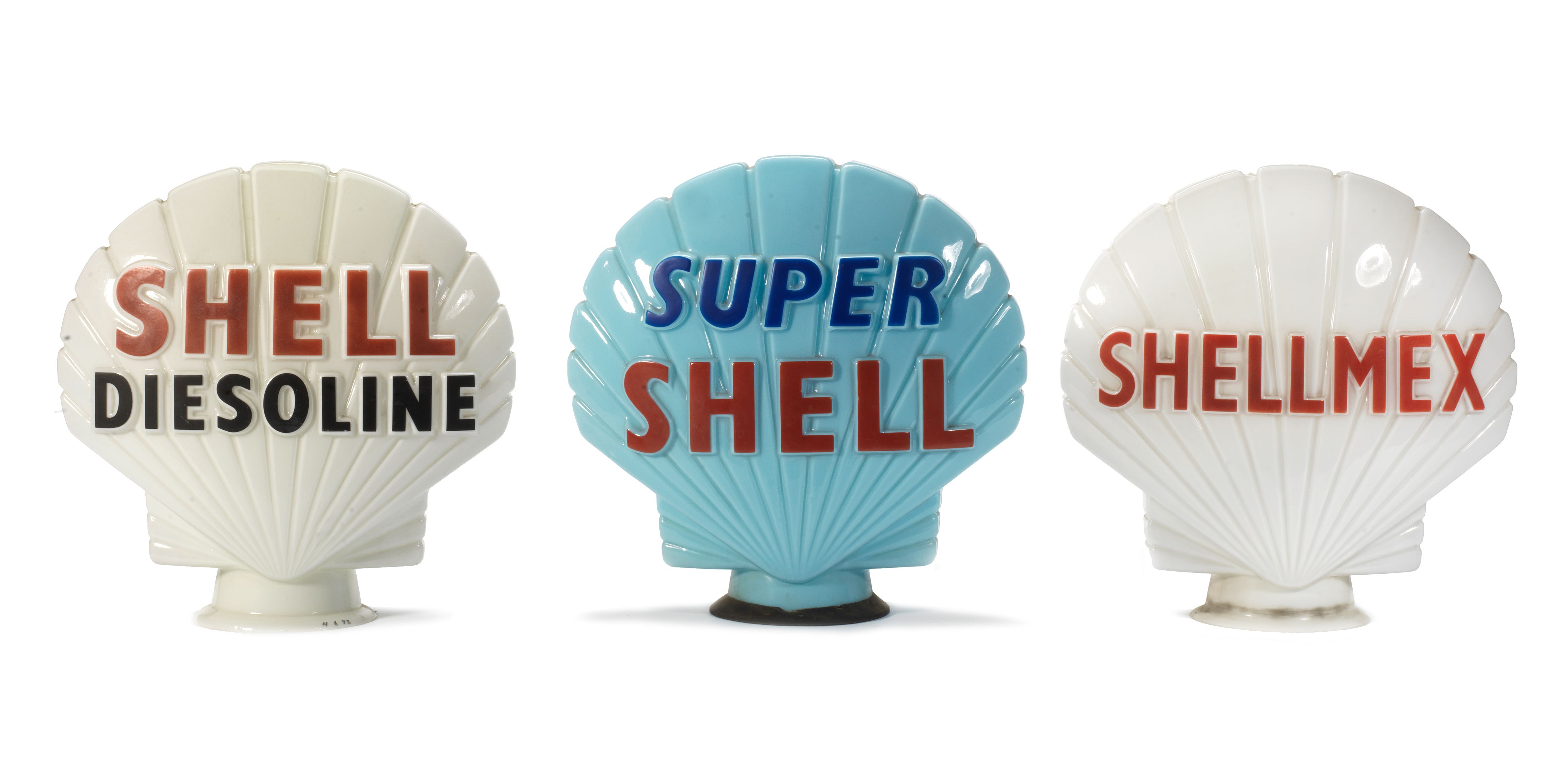 Bonhams Cars : Three Shell glass petrol pump globes,