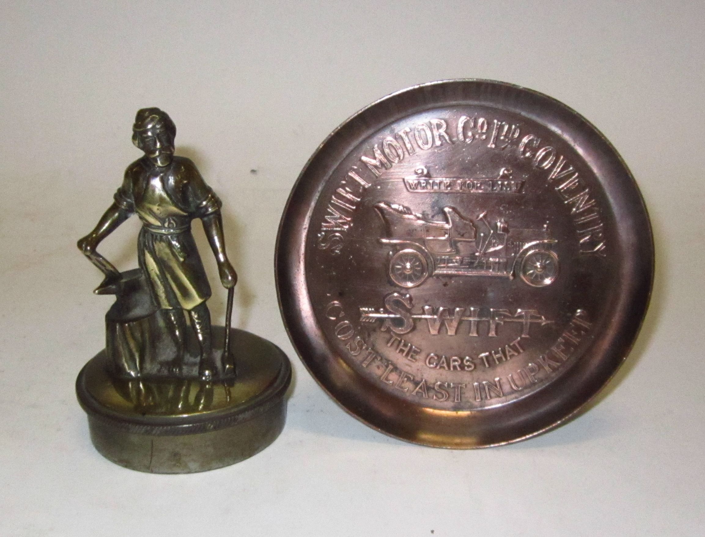 Bonhams Cars : A small Vulcan car mascot and a Swift copper ashtray,