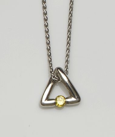 Bonhams : Paul Spurgeon: A yellow diamond and platinum pendant necklace