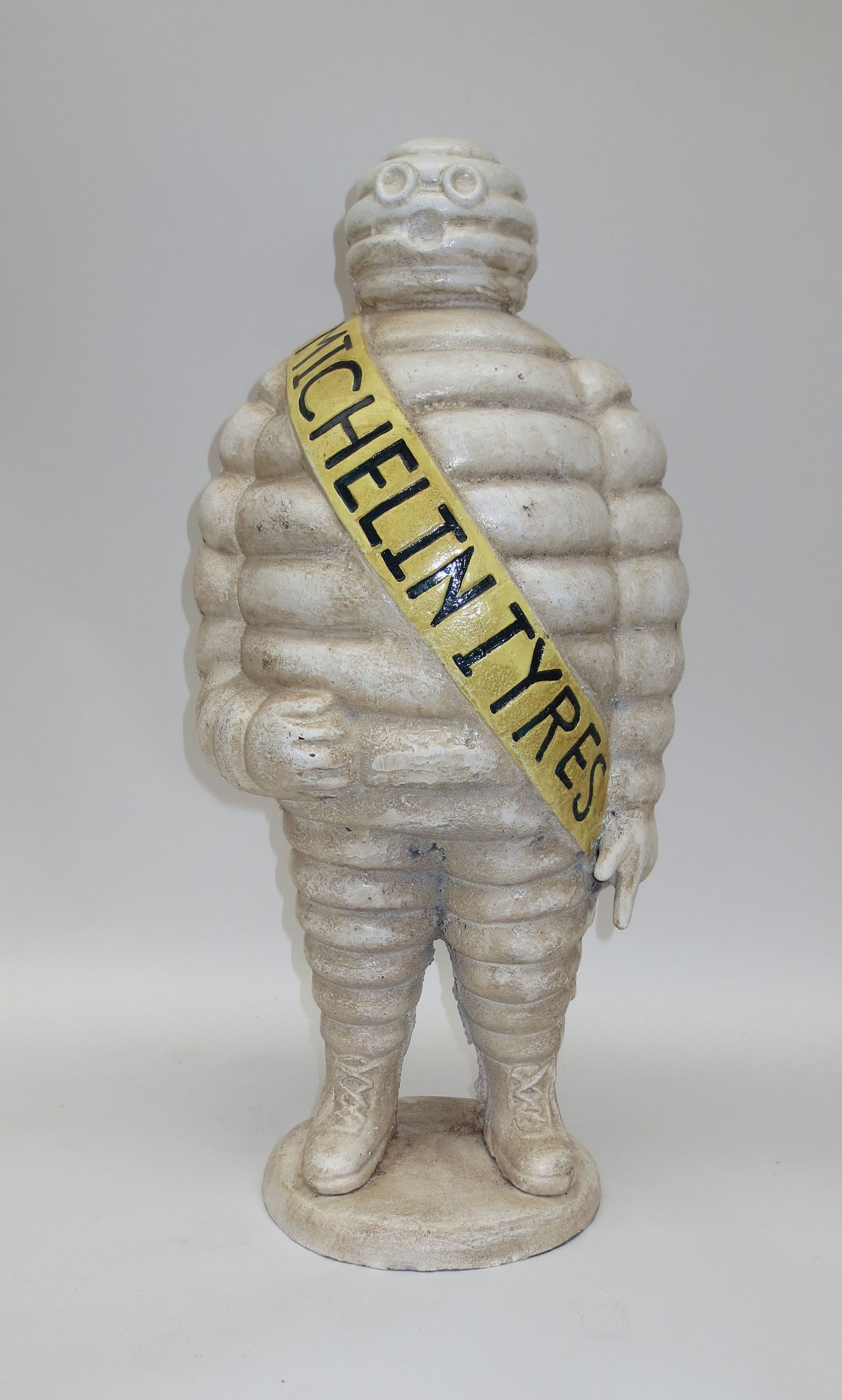 Bonhams Cars : A Mr Bibendum cast metal statue,