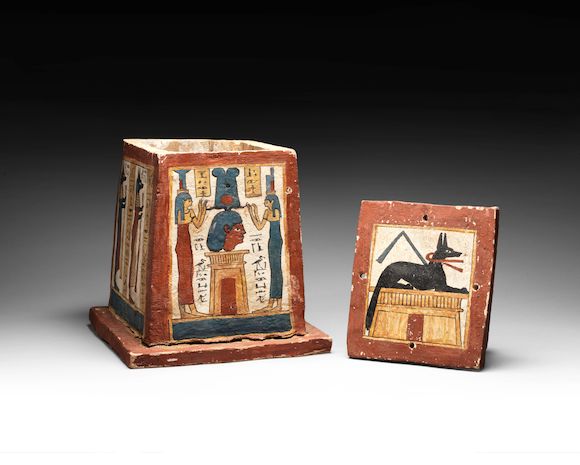 Bonhams : An Egyptian polychrome painted wood canopic jar box for ...