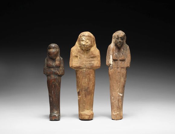 Bonhams : Three Egyptian wood shabtis 3