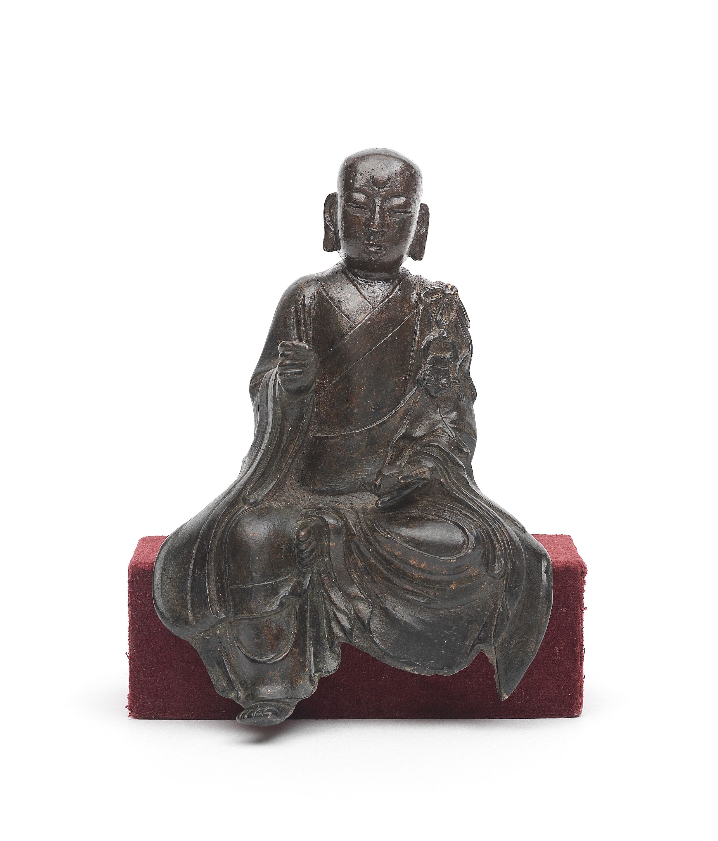 Bonhams : A bronze model of a seated monk Ming Dynasty