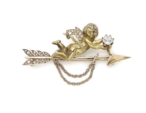 Bonhams : A diamond-set putto brooch