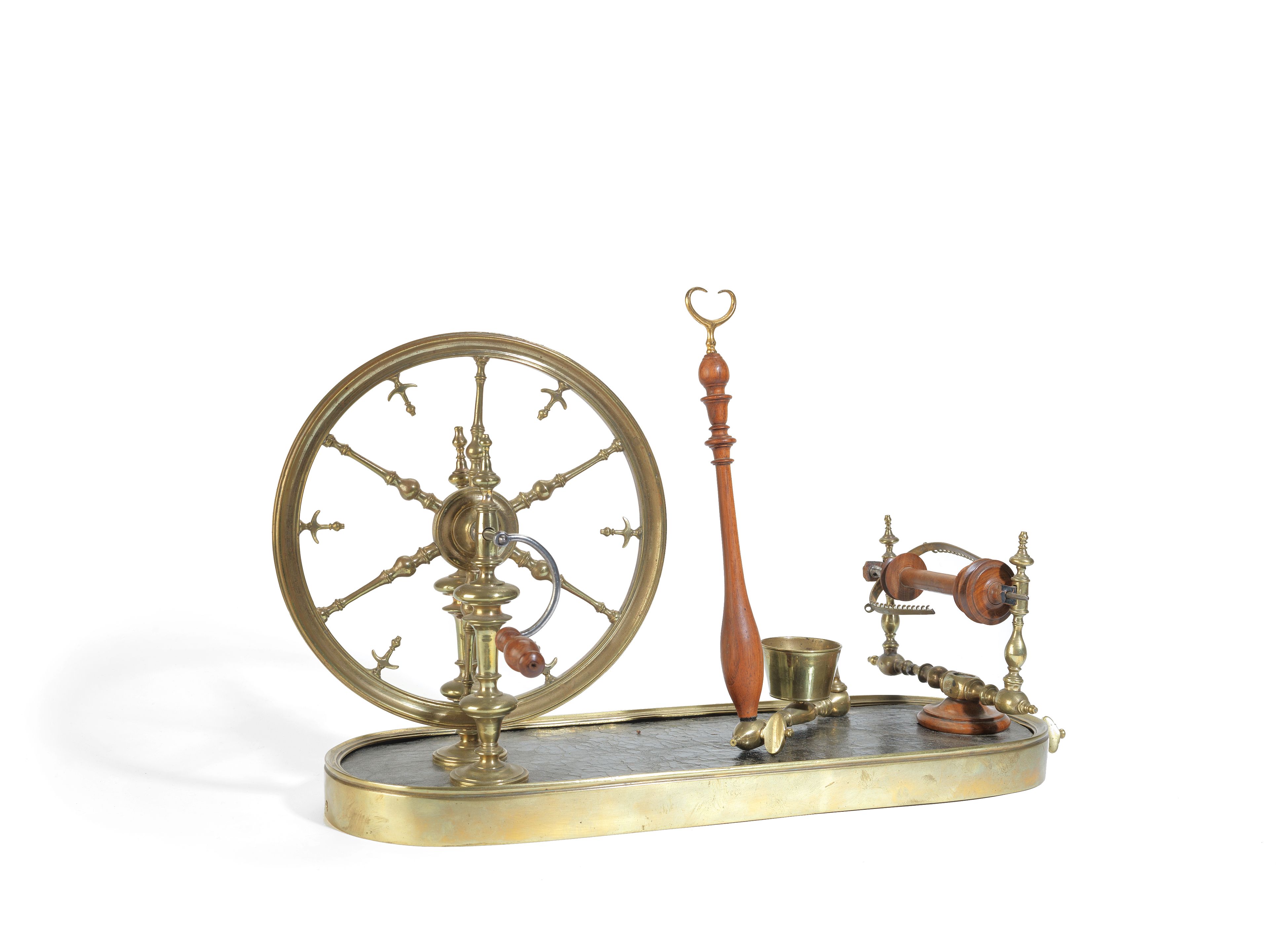 Bonhams : A mid 19th century French brass and rosewood wool winder