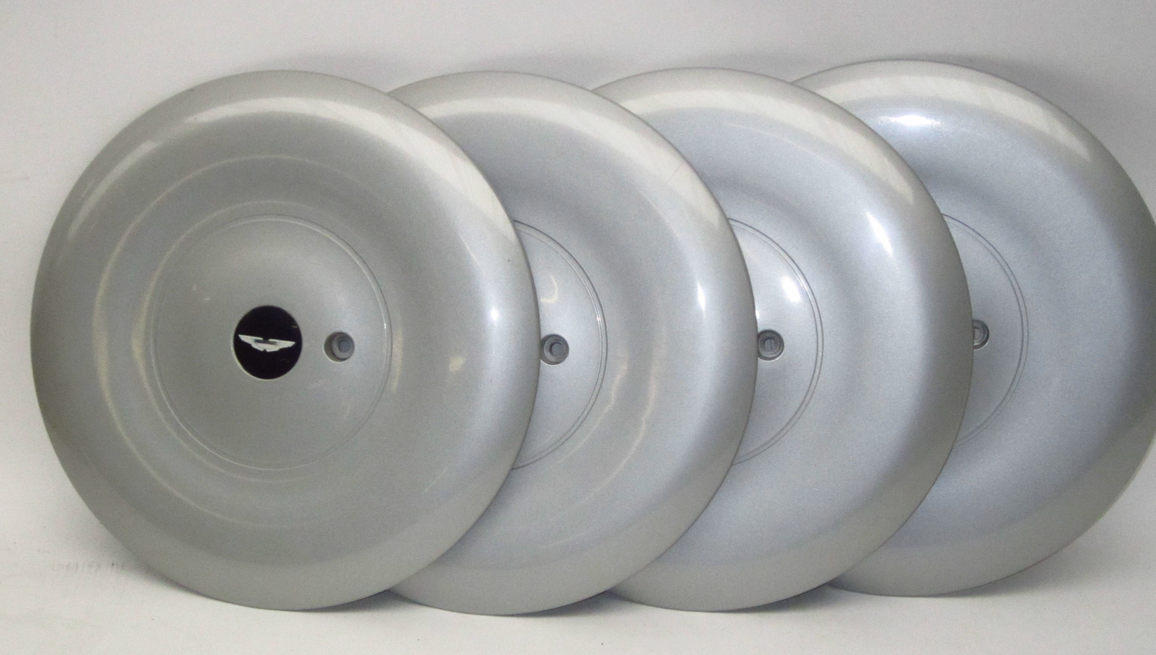 Bonhams Cars : A set of four Aston Martin DB7 wheel discs by Speedline ...
