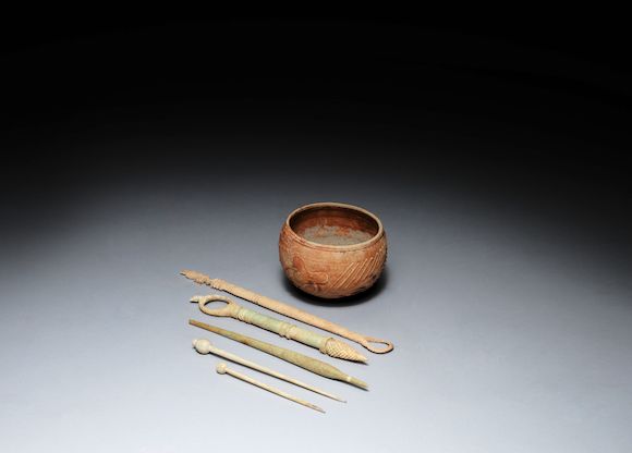 Bonhams : Five Classical bone implements and a Roman barbotine ware ...