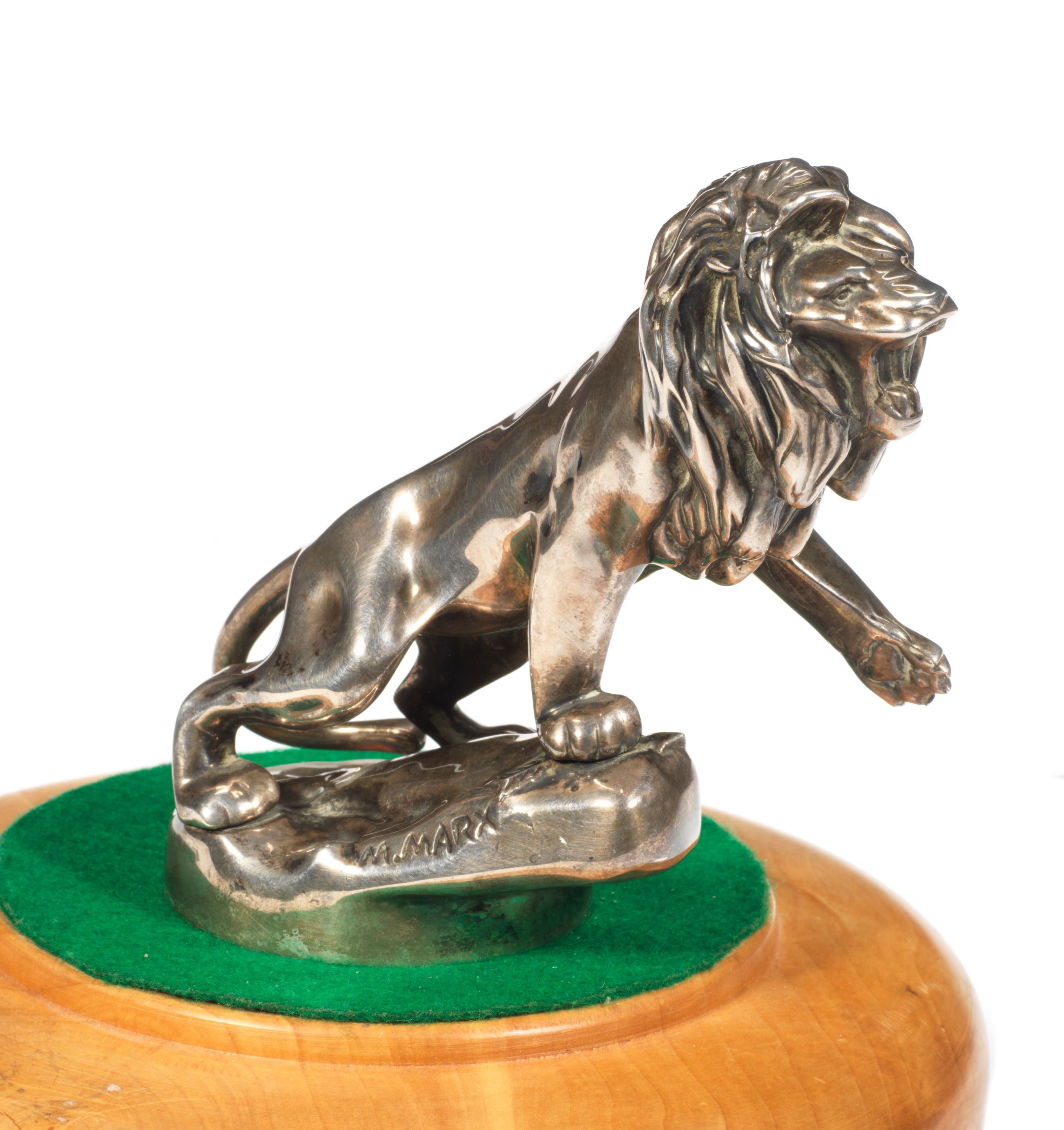 Bonhams Cars : A Peugeot Lion mascot by M Marx, French, 1920s,