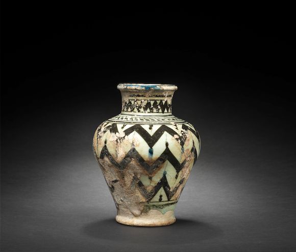Bonhams : A fine and rare Raqqa underglaze-painted pottery Jar Syria ...