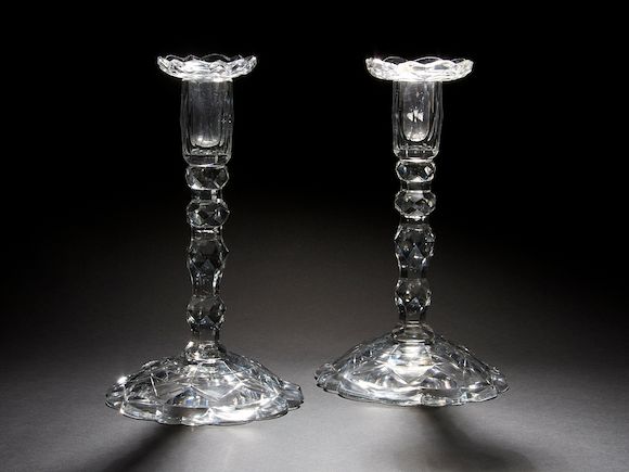 Bonhams : A pair of facet-cut candlesticks, circa 1760-70