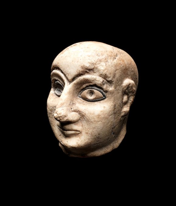 Bonhams : A Mesopotamian gypsum head of a man