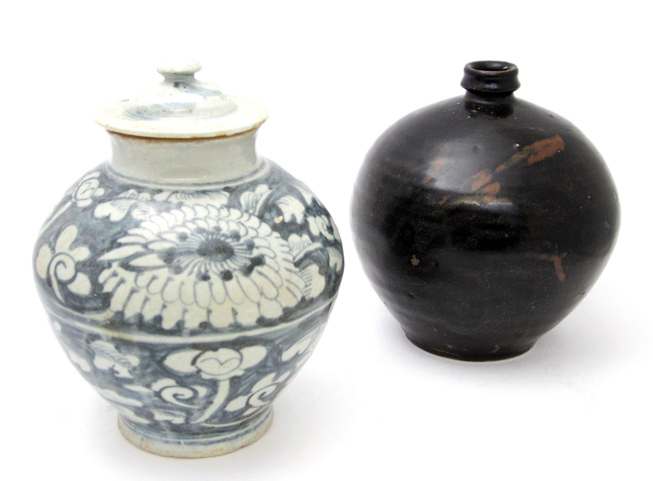 Bonhams : A Henan black ware jar and a Swatow ware jar and cover