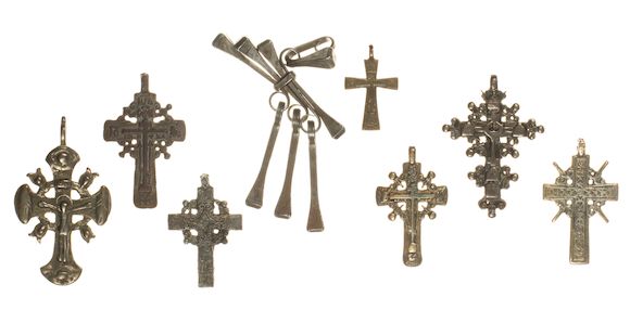 Bonhams : A collection of seven bronze and silver pectoral crosses ...