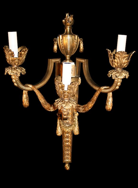 Bonhams : A set of four gilt bronze three light wall appliqués in the ...