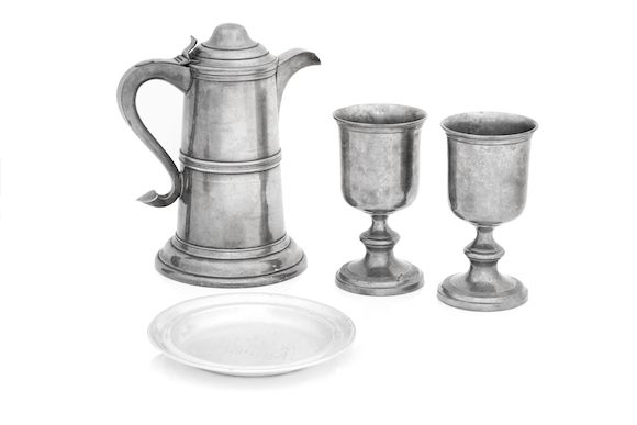 Bonhams : A 19th century pewter Communion set