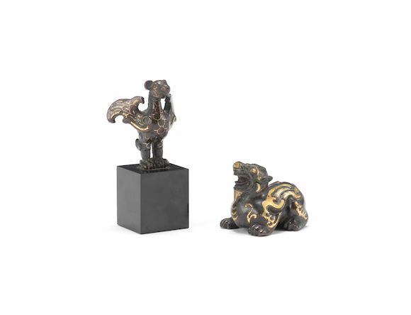 Bonhams : A bronze gold-inlaid bird finial and a bronze gold-inlaid ...