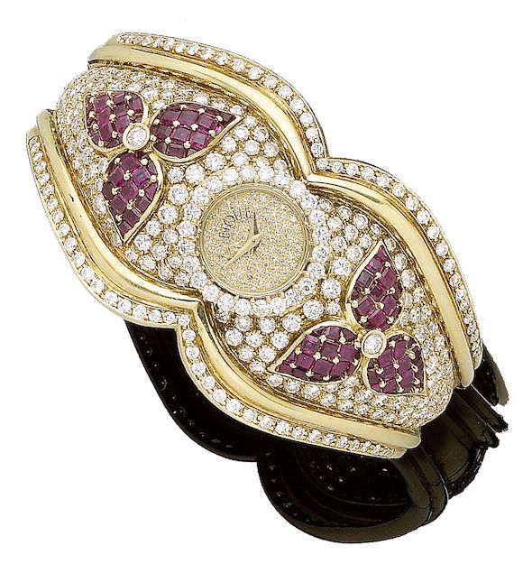 Bonhams : A ruby and diamond bangle watch, by Etoile