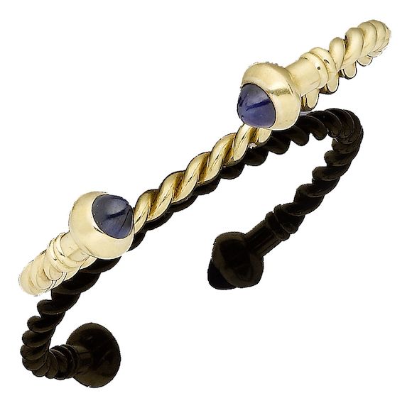Bonhams : A sapphire-set torque bangle