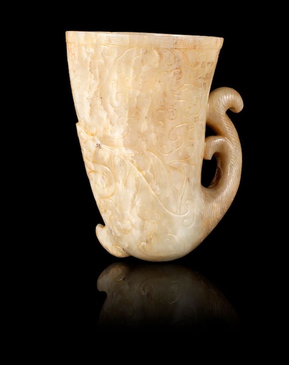 Bonhams : A pale green jade rhyton cup Ming Dynasty