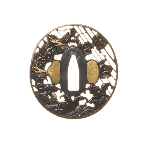 Bonhams : A shakudo sukashi tsuba After Yanagawa Naomasa, 19th century