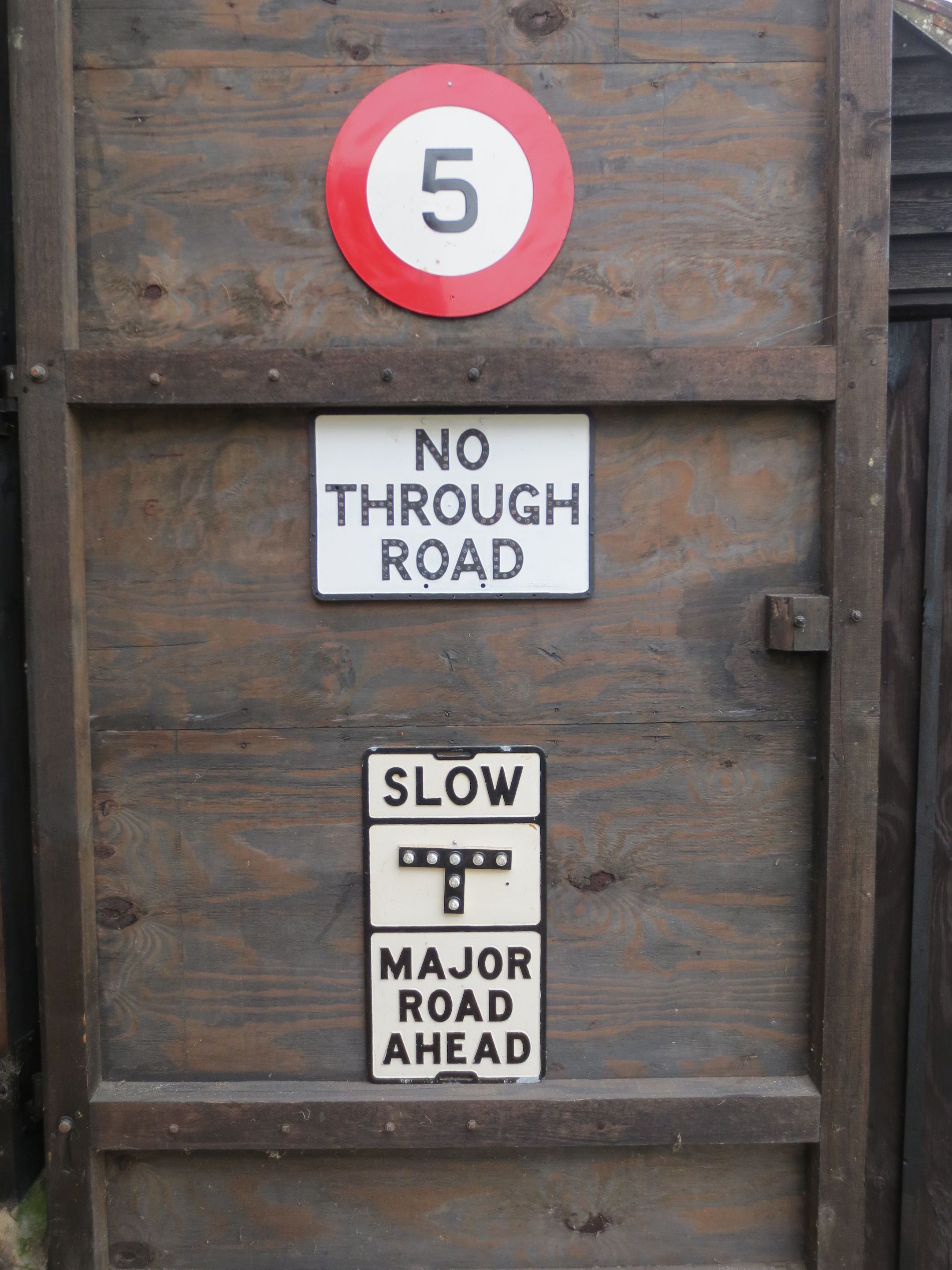Bonhams Cars : Two reflective road signs,
