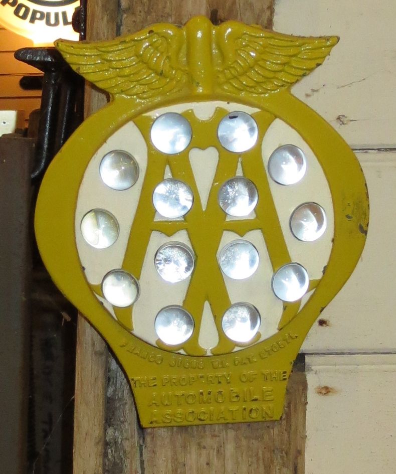 Bonhams Cars : An 'AA' cast-iron reflective pole head marker,