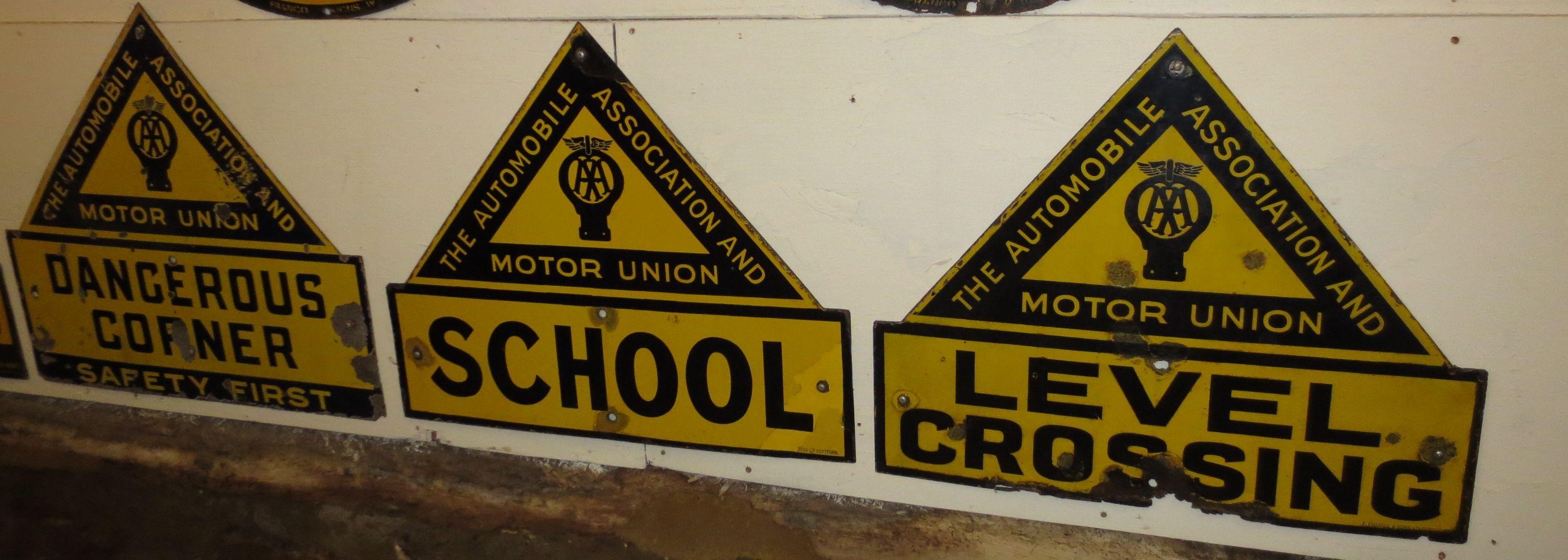 Bonhams Cars : Three AA & MU warning triangle enamel signs, 1911-1914,